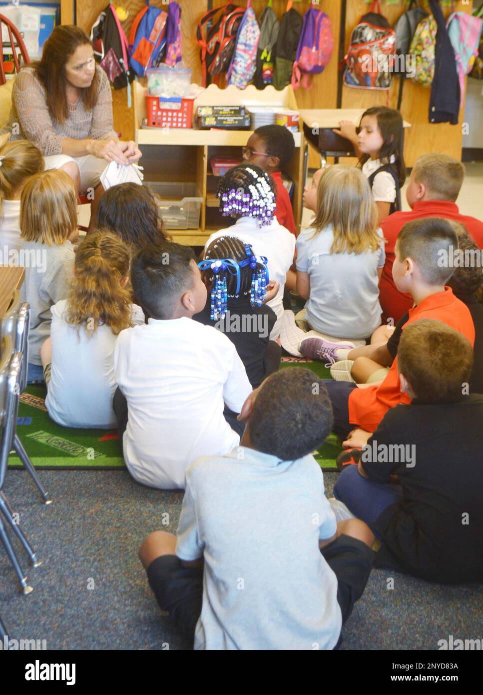 Sandra Carpenter goes over classroom rules with her new second graders ...