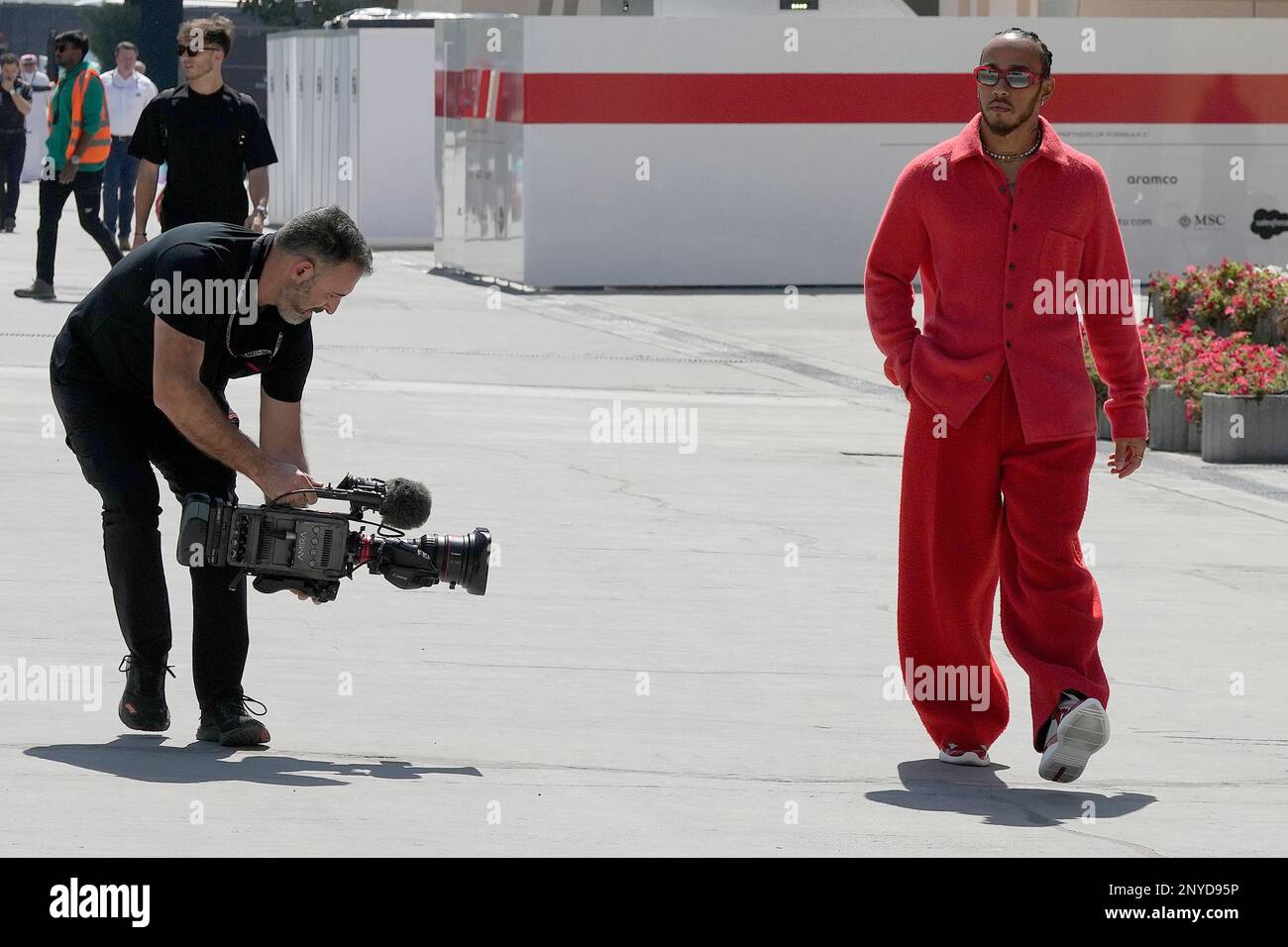 Mercedes driver Lewis Hamilton of Britain arrives at the Bahrain ...