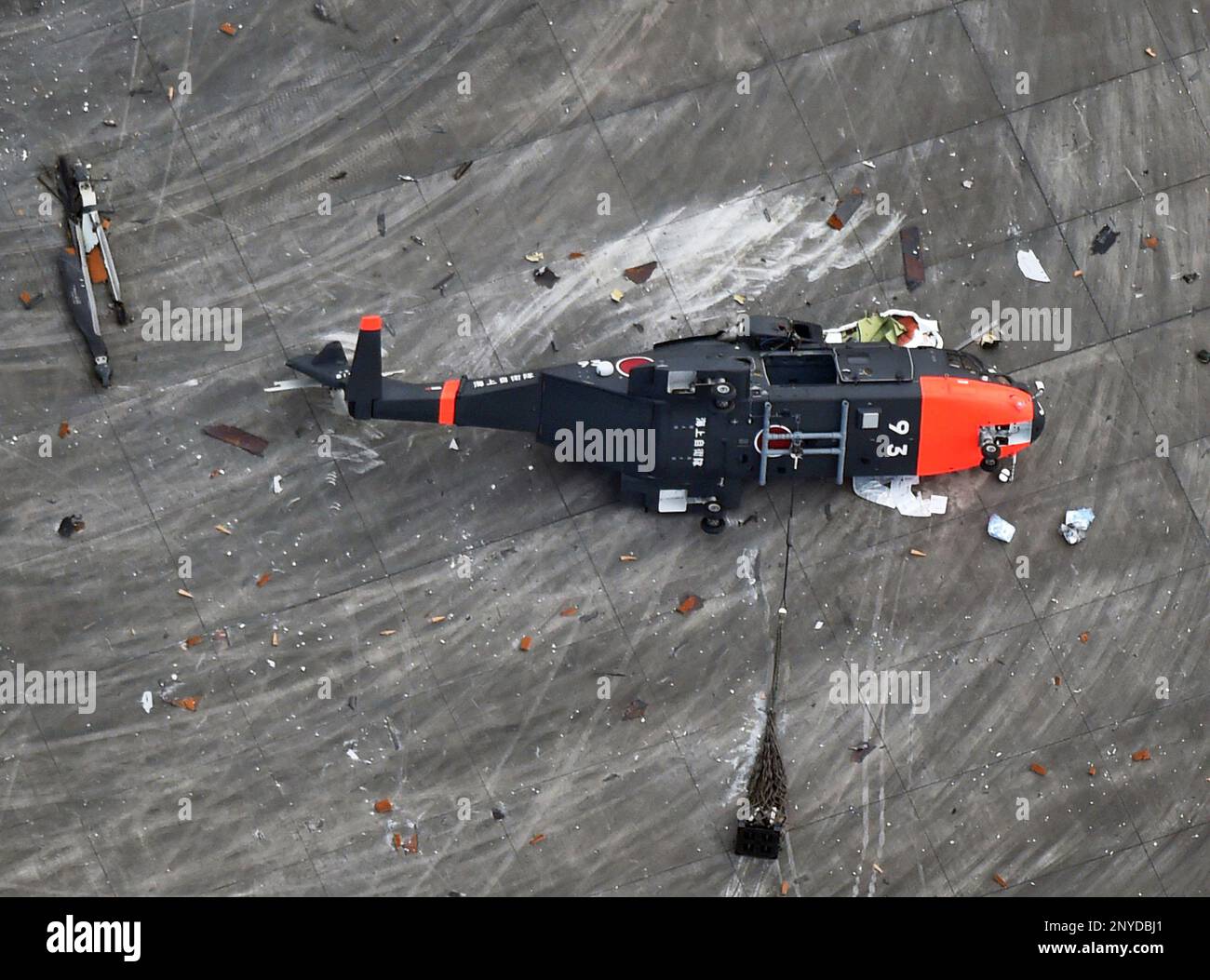 This aerial photo shows Japanese Maritime Self‐Defense Force helicopter ...