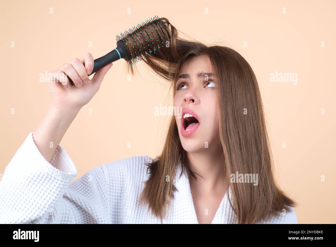 Messy hair, sad woman with hairloss problem Stock Photo - Alamy