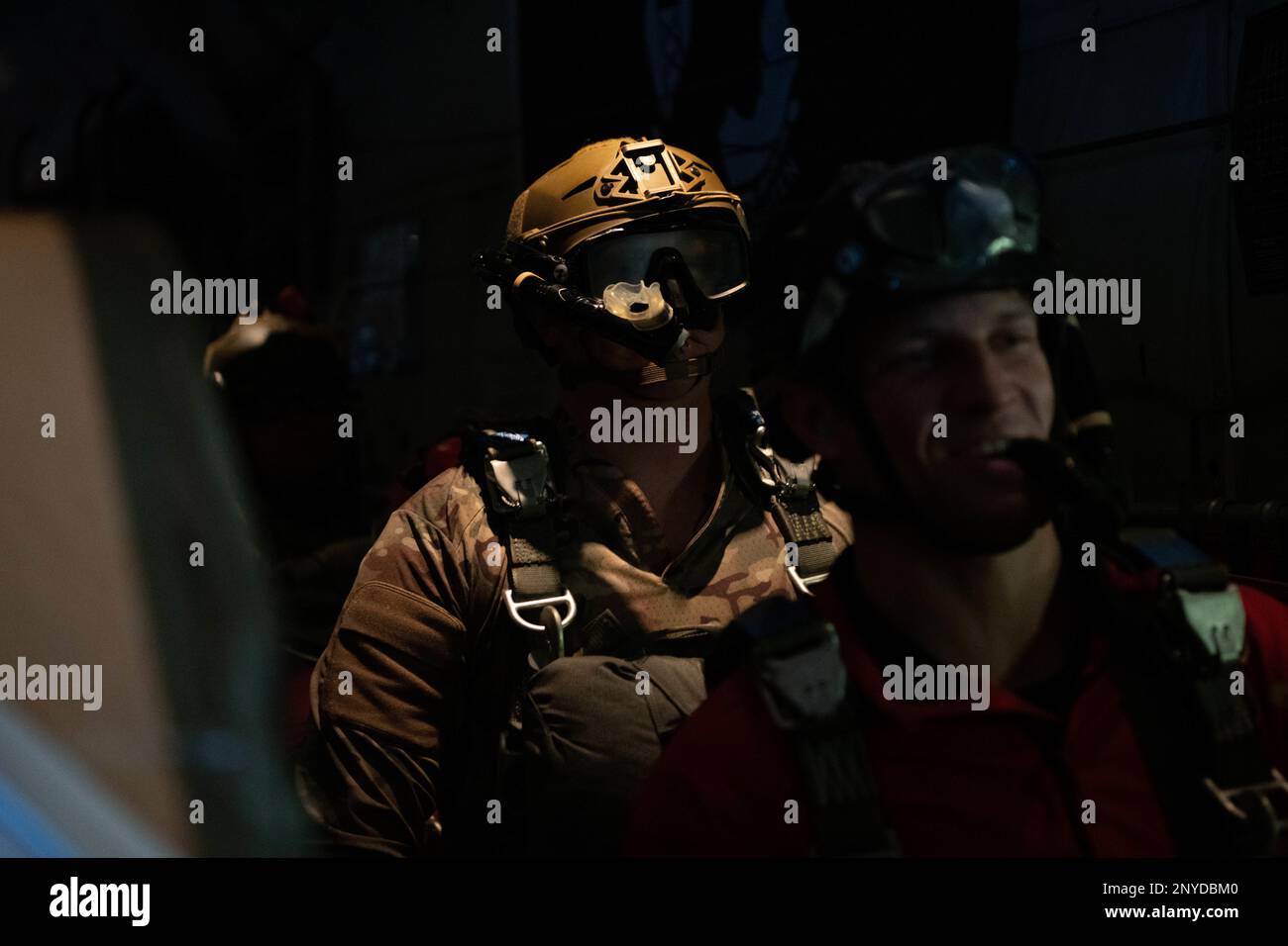U.S. Air Force 31st Rescue Squadron pararescuemen wait in an MC-130J ...
