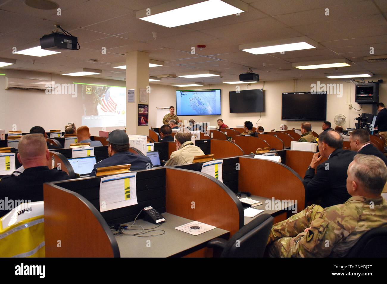 Col. Sam Kline, commander of U.S. Army Garrison Presidio of Monterey, holds an after-action ...