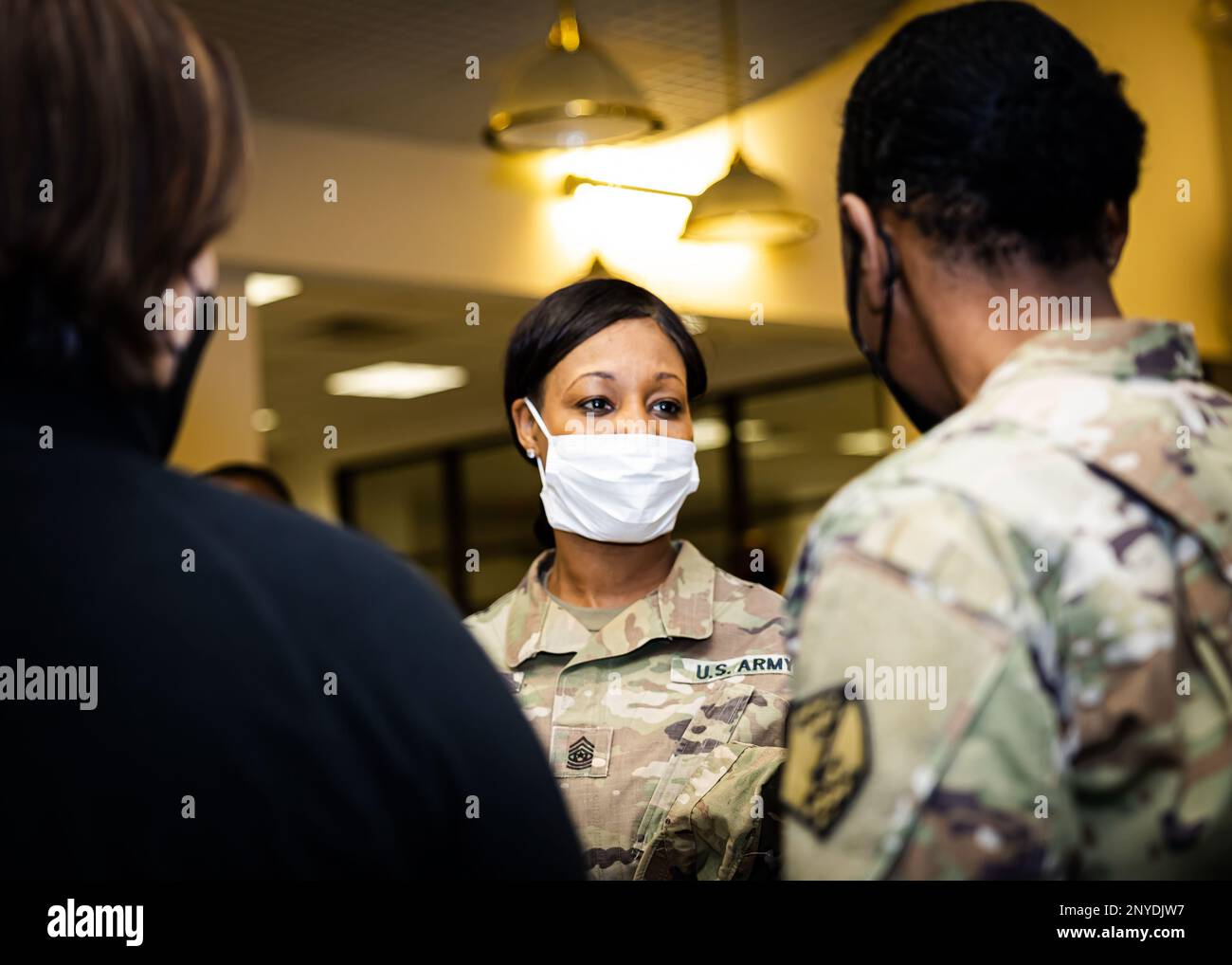 Command Sgt. Maj. Tamisha A. Love (center), Fort Lee garrison command ...