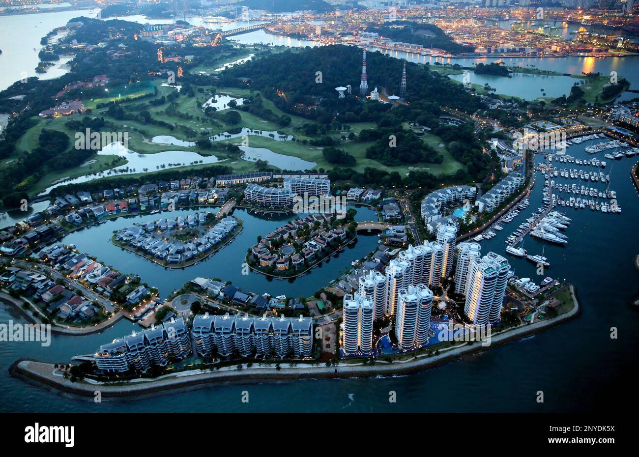 Aerial view of Sentosa Cove. Behind is the Tanjong Golf Course. Eight ...