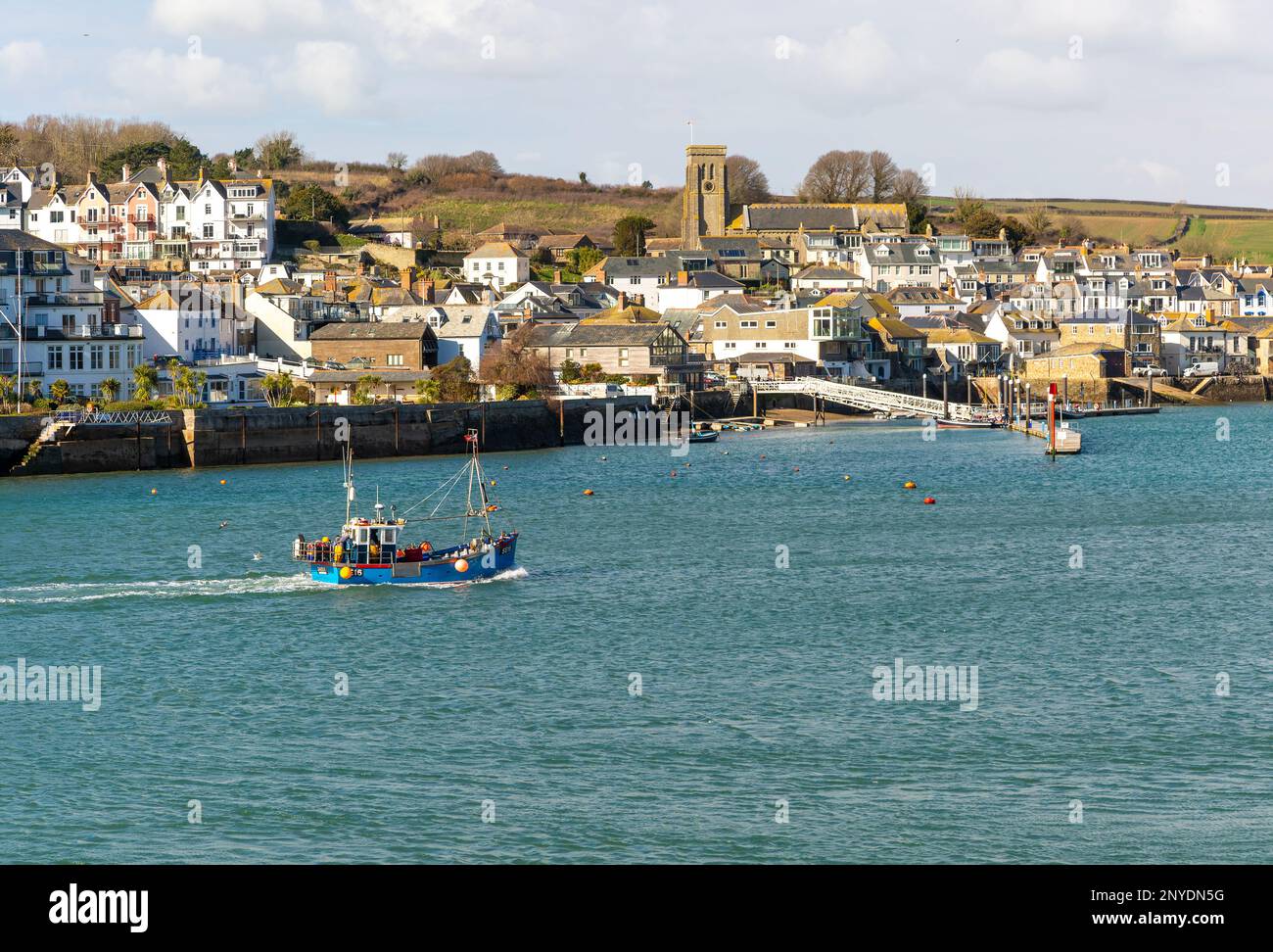 View of fishing boat returning to port, Salcombe, Devon, England, UK ...