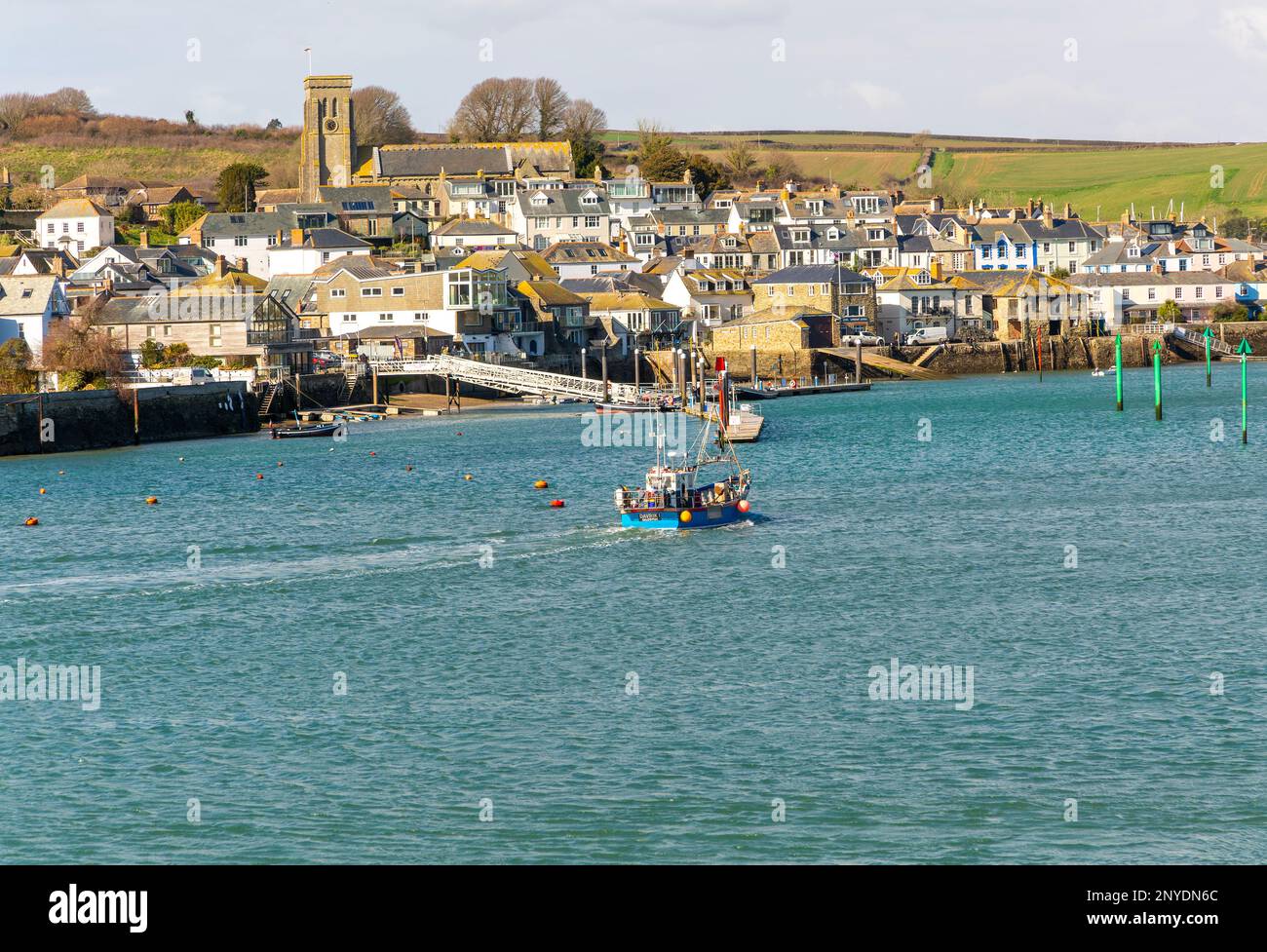 View of fishing boat returning to port, Salcombe, Devon, England, UK ...