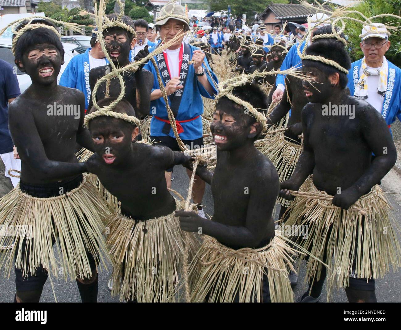 Children, clad in head-to-toe in soot parade the streets drawing a ...
