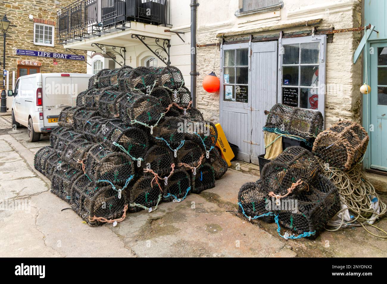 Lobster pots on quayside, Salcombe, Devon, England, UK Stock Photo - Alamy