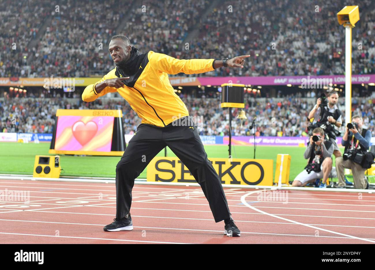 Jamaica's Usain Bolt strikes a pose during a retirement ceremony at ...