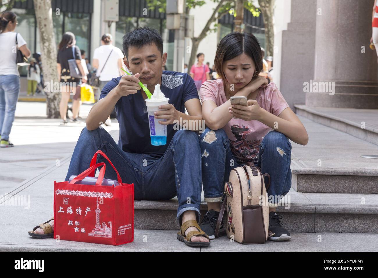 Chinese tourists in Shanghai Stock Photo - Alamy