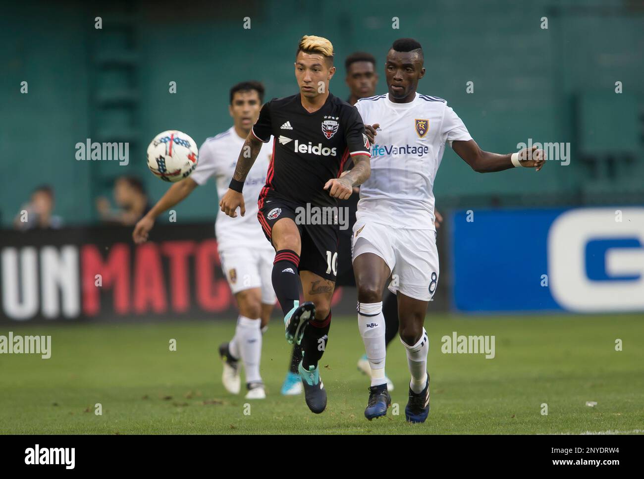 WASHINGTON, DC - AUGUST 12: Real Salt Lake midfielder Stephen Sunny Sunday (8) tackles D.C ...