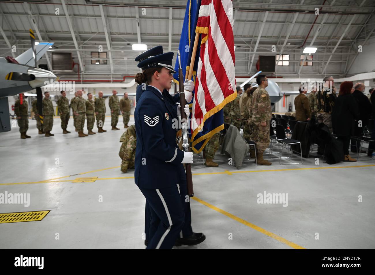 The 174th Attack Wing Honor Guard prepare to present the colors during ...