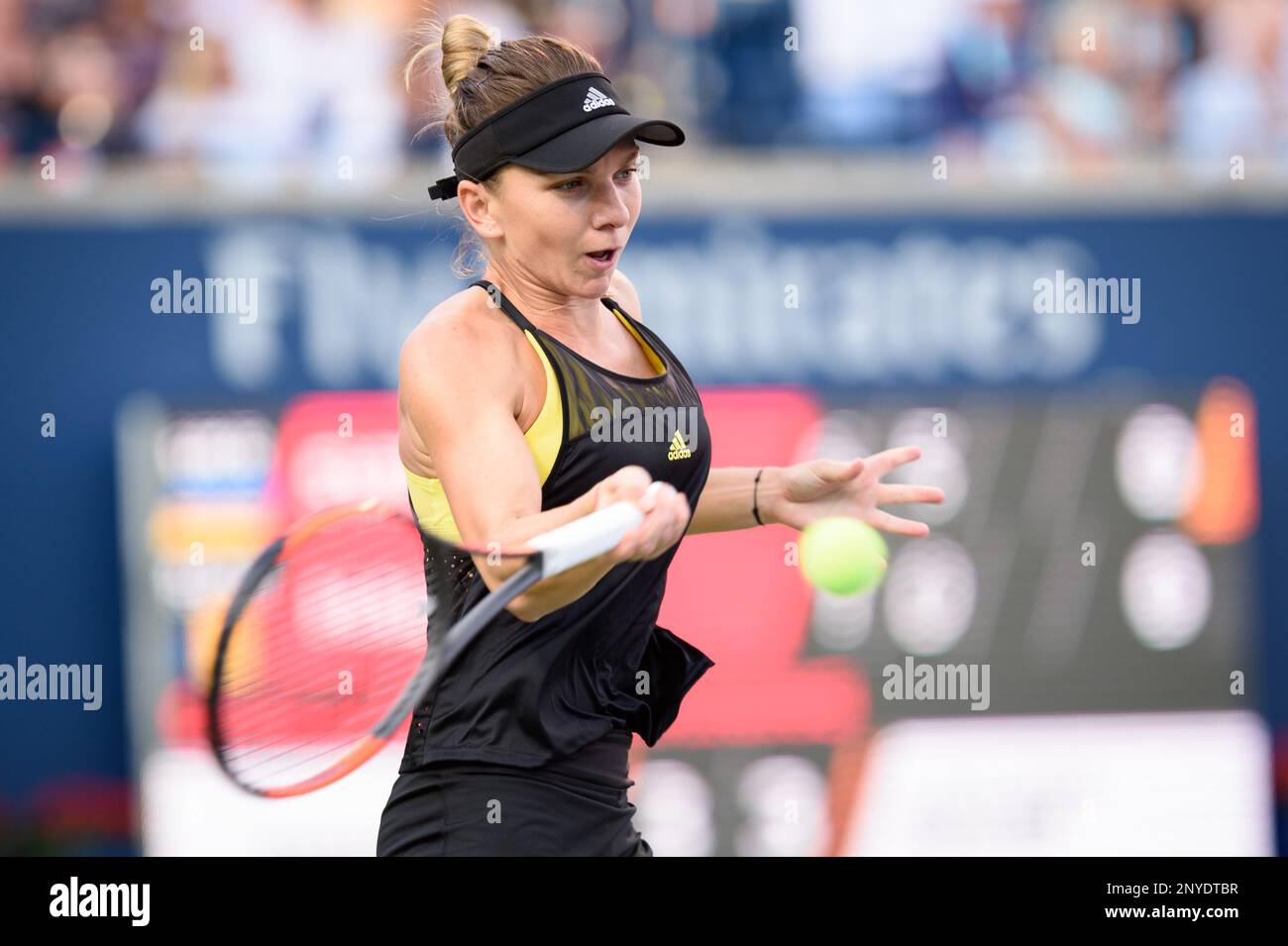TORONTO, ON - AUGUST 12: Simona Halep of Romania (ROU) returns the ball ...