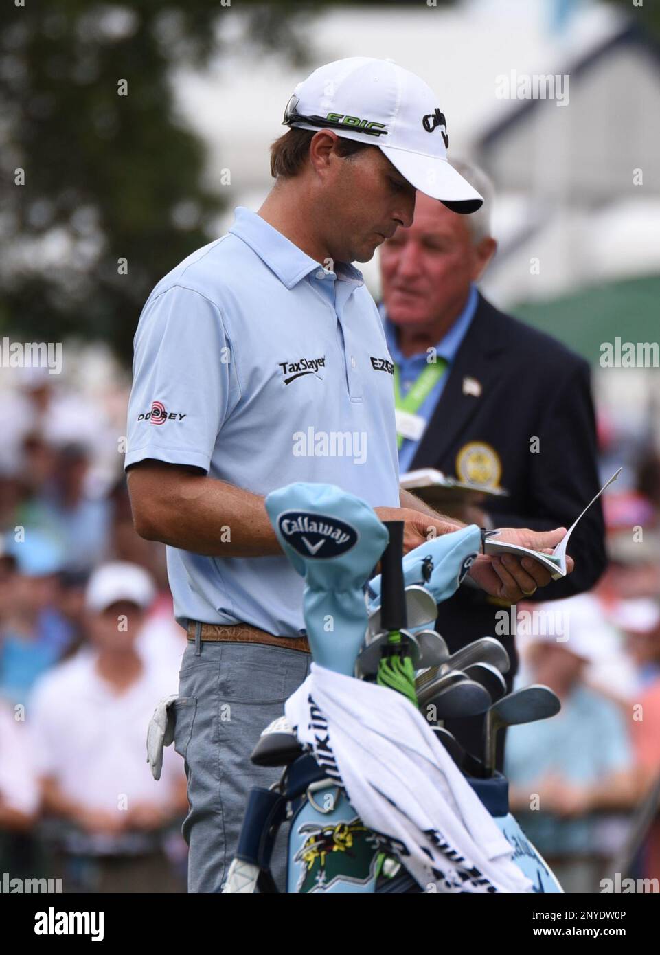 CHARLOTTE, NC - AUGUST 13: Kevin Kisner takes the scorecard prior to ...