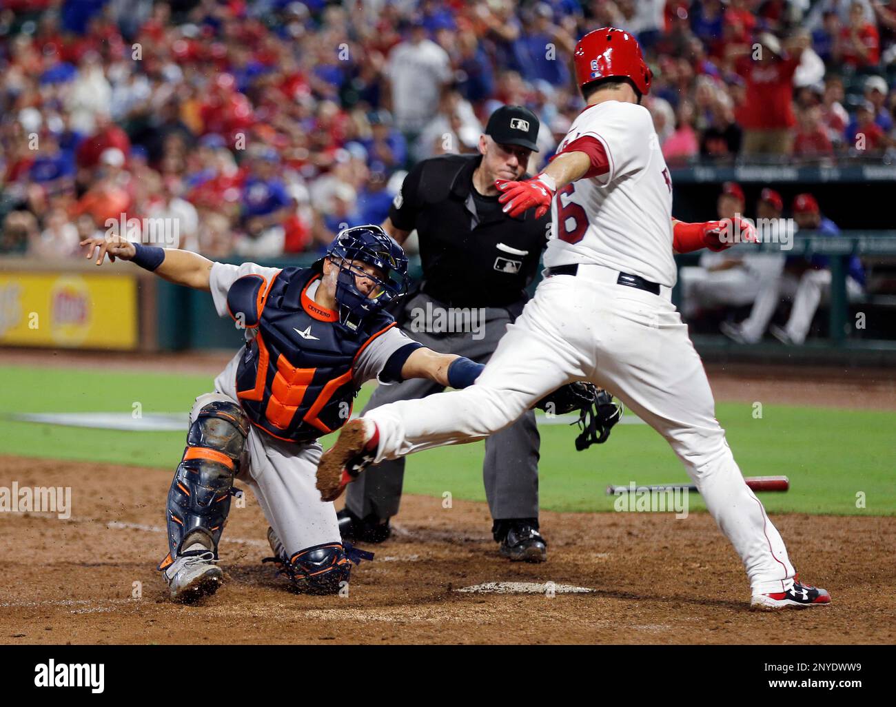 Houston Astros catcher Juan Centeno, left, tags out Texas Rangers ...