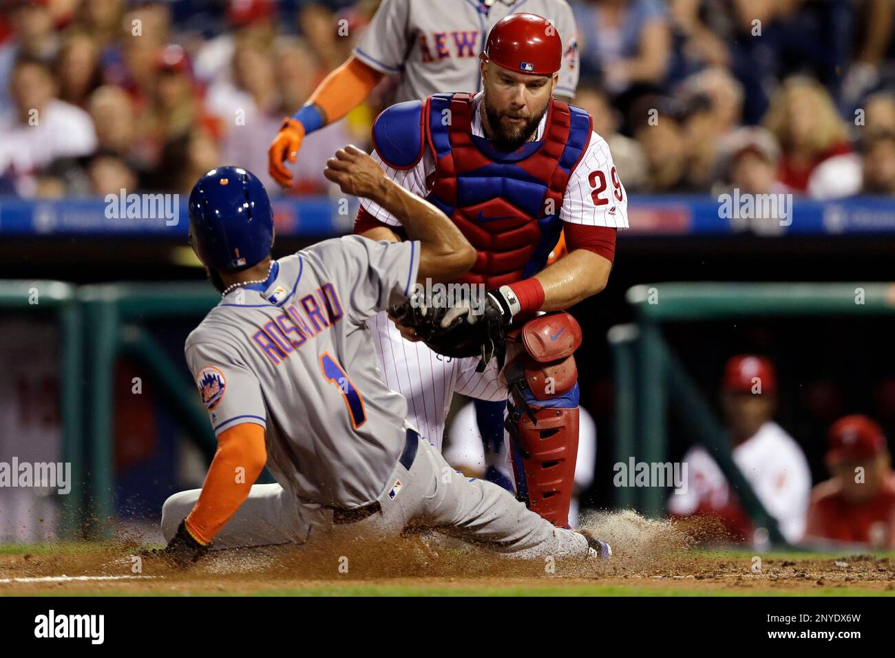 Philadelphia Phillies catcher Cameron Rupp, right, tags out New York ...