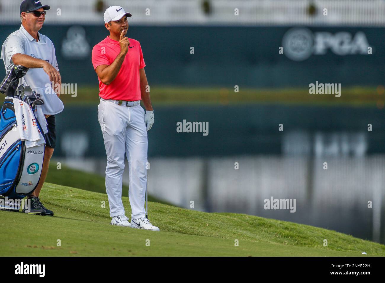 August 10, 2017: Jason Day of Australia talks with his caddie on the ...