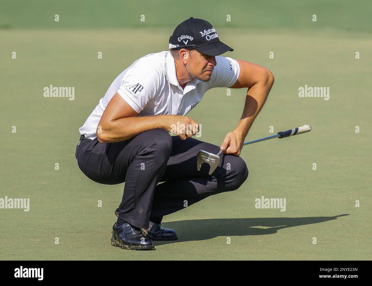 August 10, 2017: Henrik Stenson of Sweden checks for a line on the 13th ...