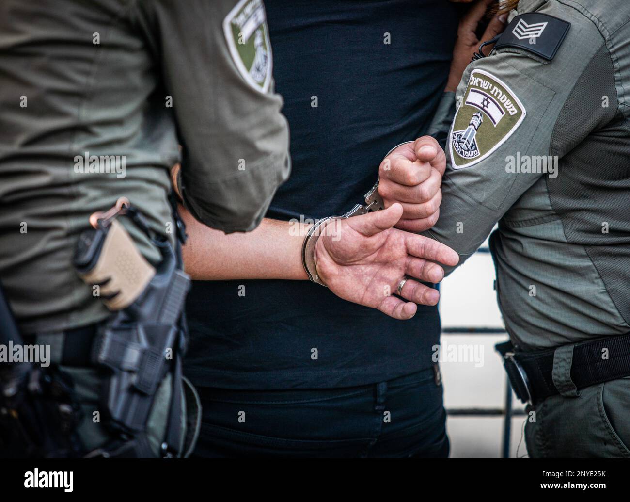 Handcuffed protestor hi-res stock photography and images - Alamy