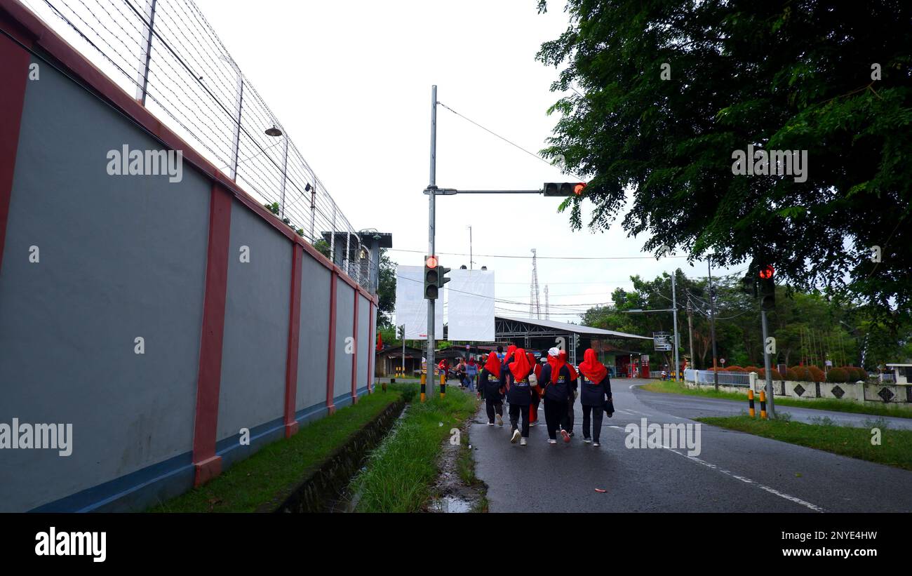Several Women Who Were Walking On The Streets Of The City Muntok In The ...