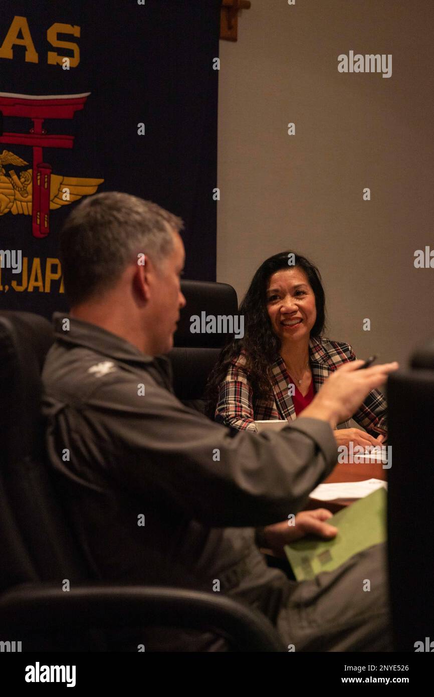 U.S. Navy Ombudsman-At-Large Junifer Thomas speaks with U.S. Navy Capt ...