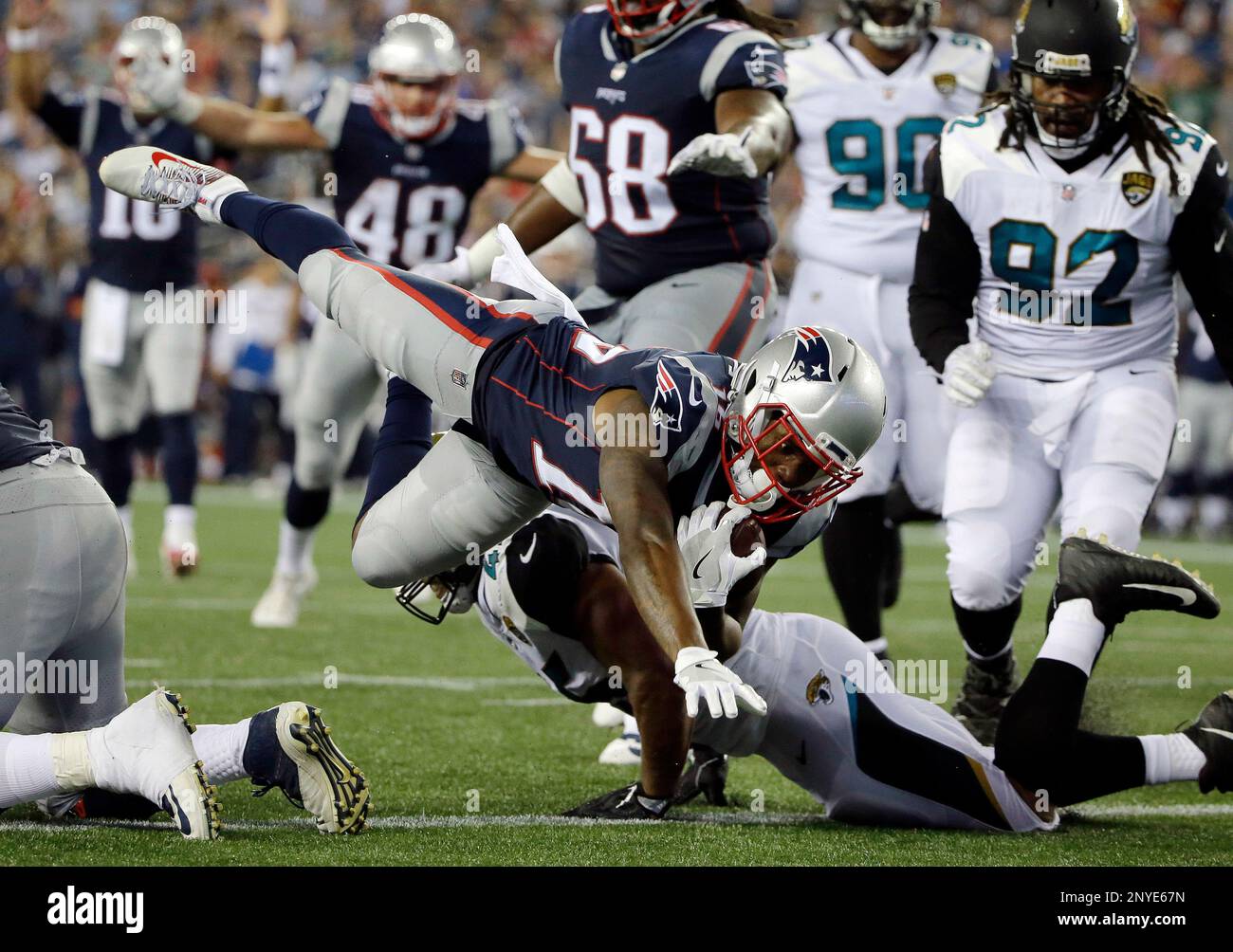 New England Patriots wide receiver K.J. Maye dives over Jacksonville ...