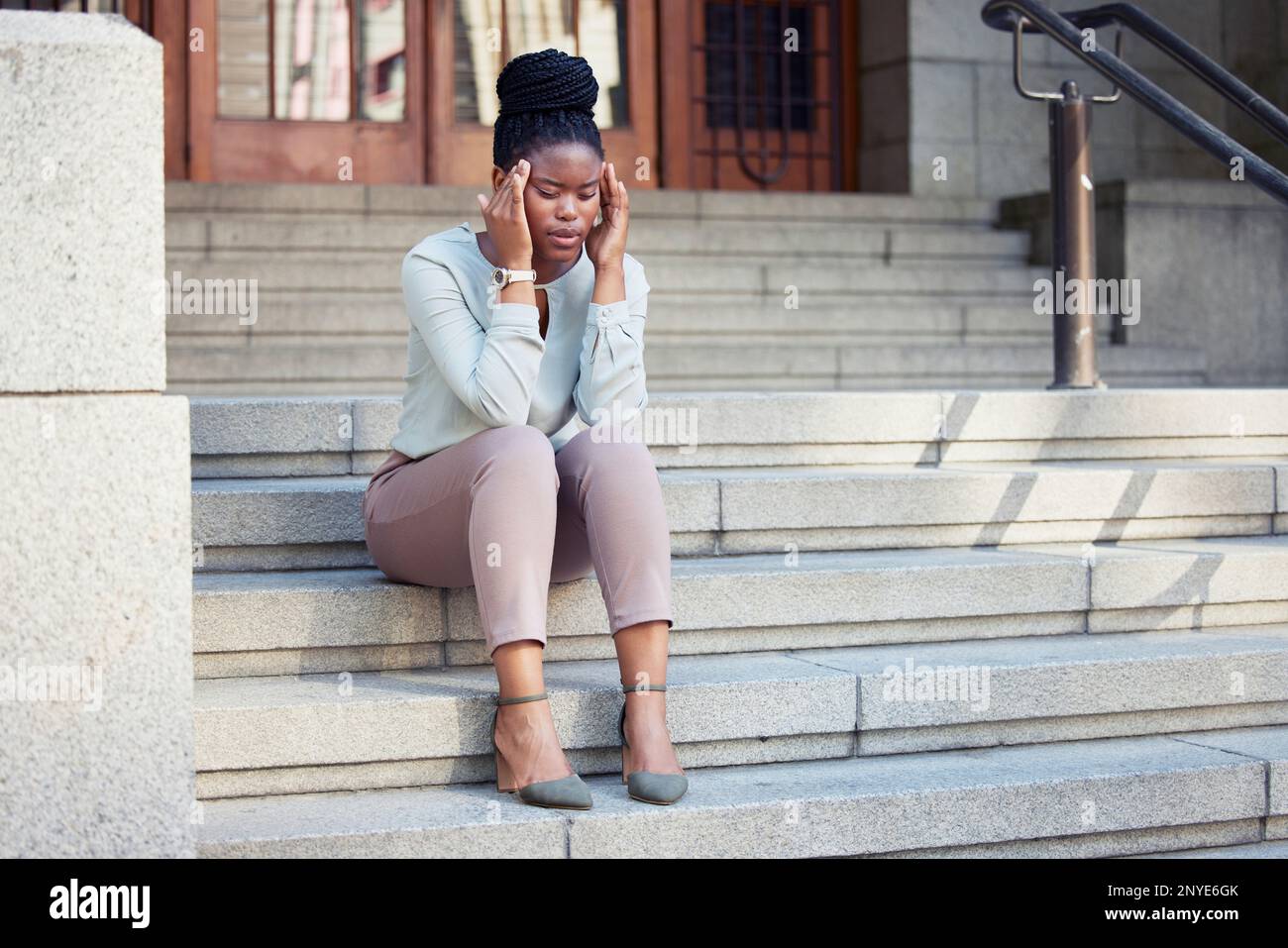Stress, headache and black woman on stairs with anxiety, panic attack ...
