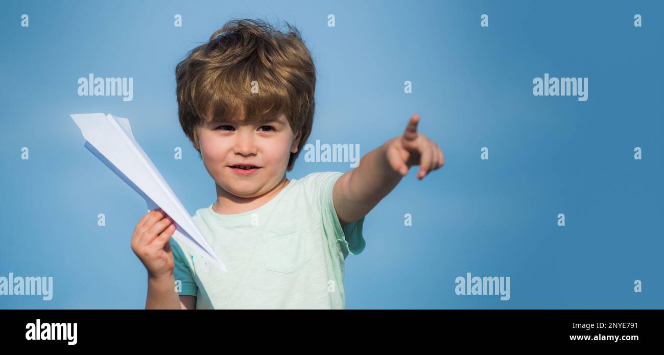 Close up portrait of cute child outdoors. Spring banner for website ...
