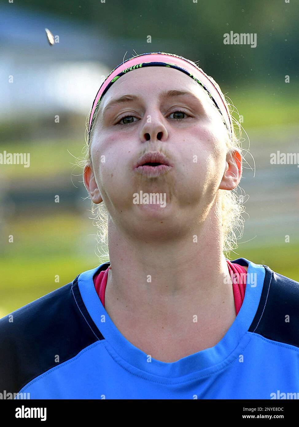Bandi Wiggs competes in the sunflower seed spitting contest, winning ...