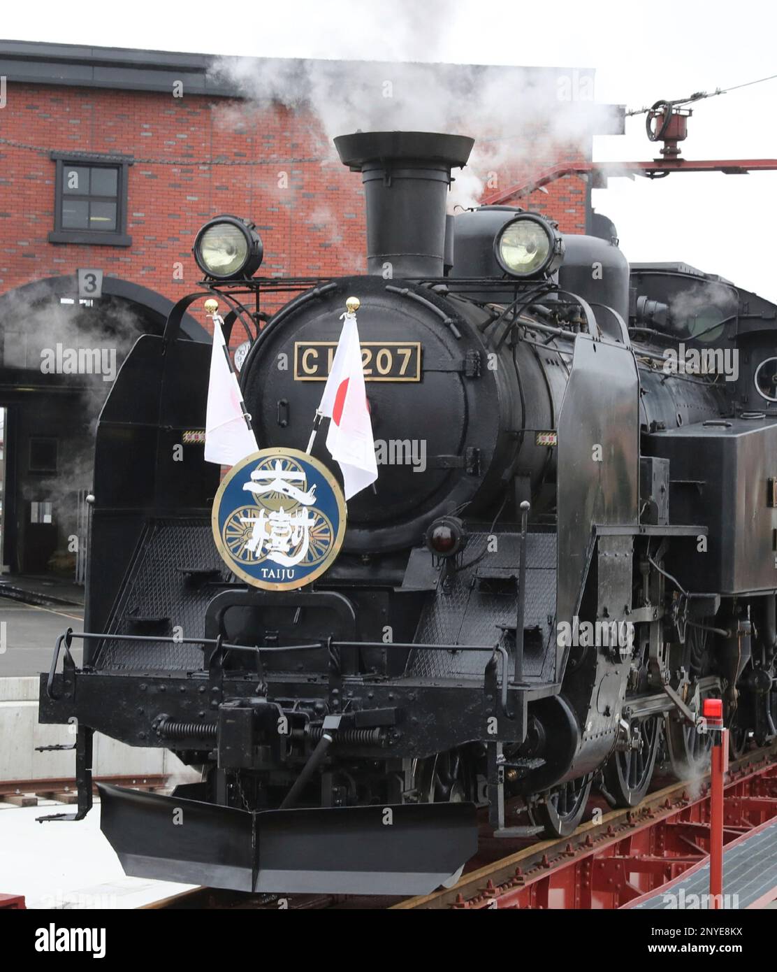 Taiju, a steam locomotive train, is shown at Shimo-Imaichi Station on ...