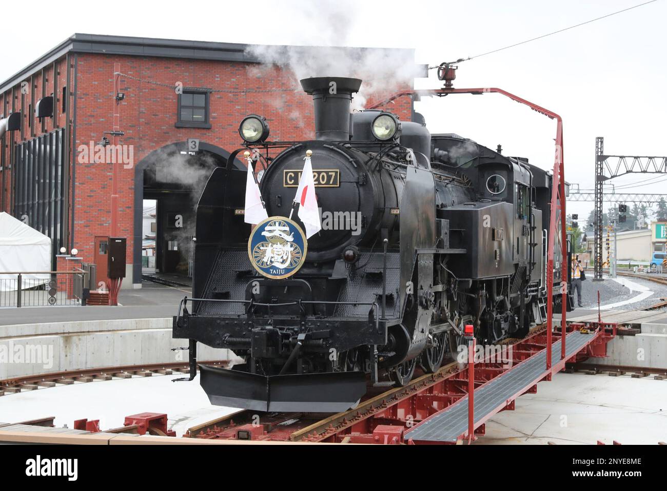 Taiju, a steam locomotive train, is shown at Shimo-Imaichi Station on ...