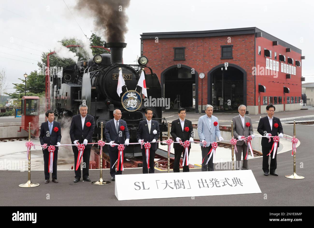 Taiju, a steam locomotive train, is shown at Shimo-Imaichi Station ...