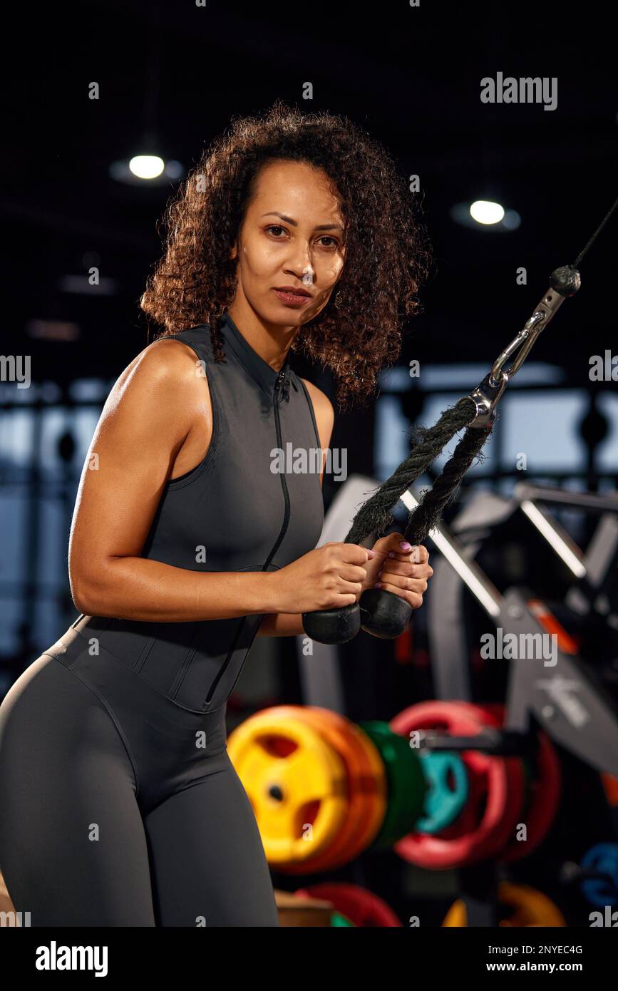 African American woman exercising or exercising in the gym, doing ...