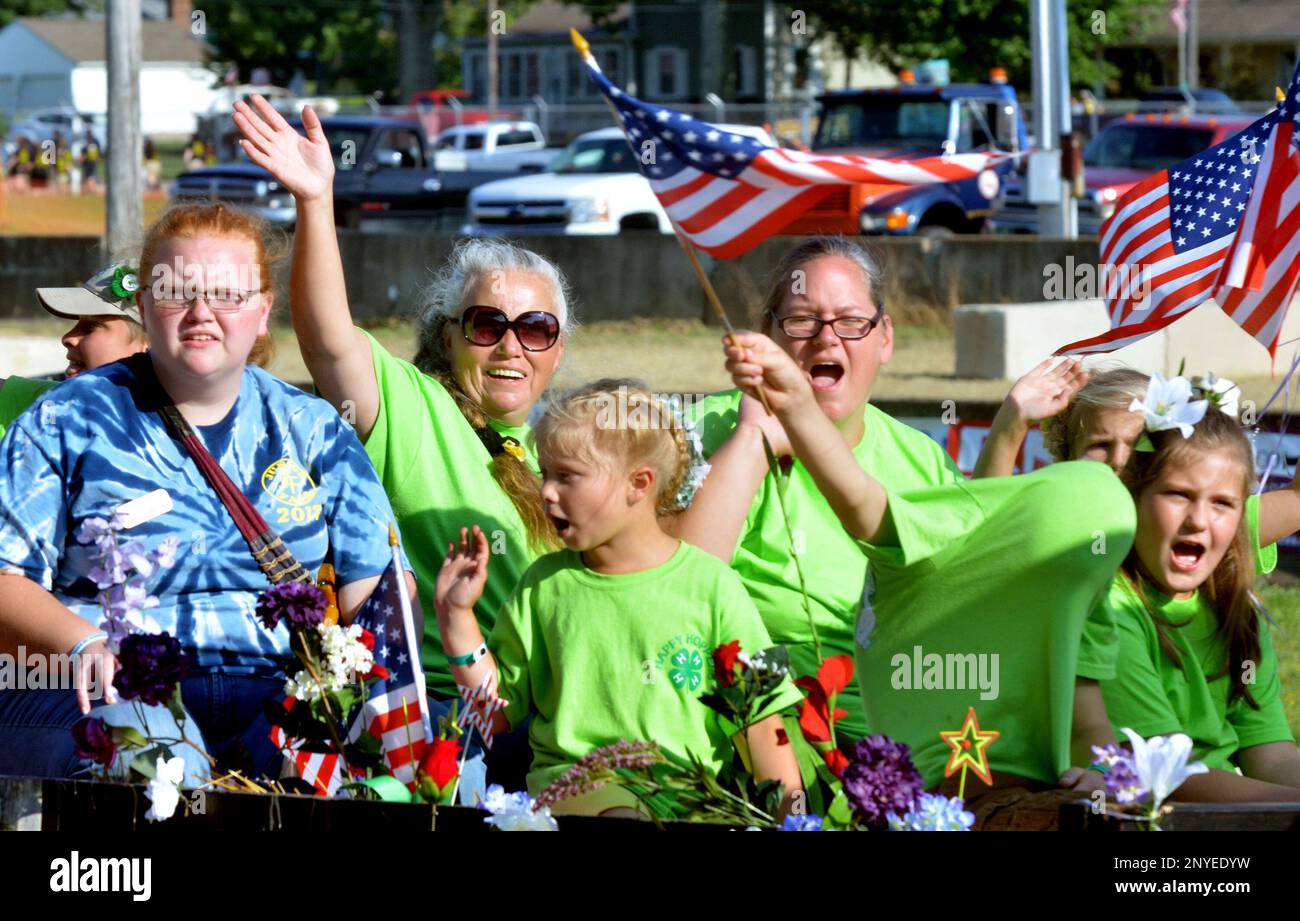 The Happy Hoppers 4-H Club wave to the crowd on Tuesday Aug. 8, 2017 ...