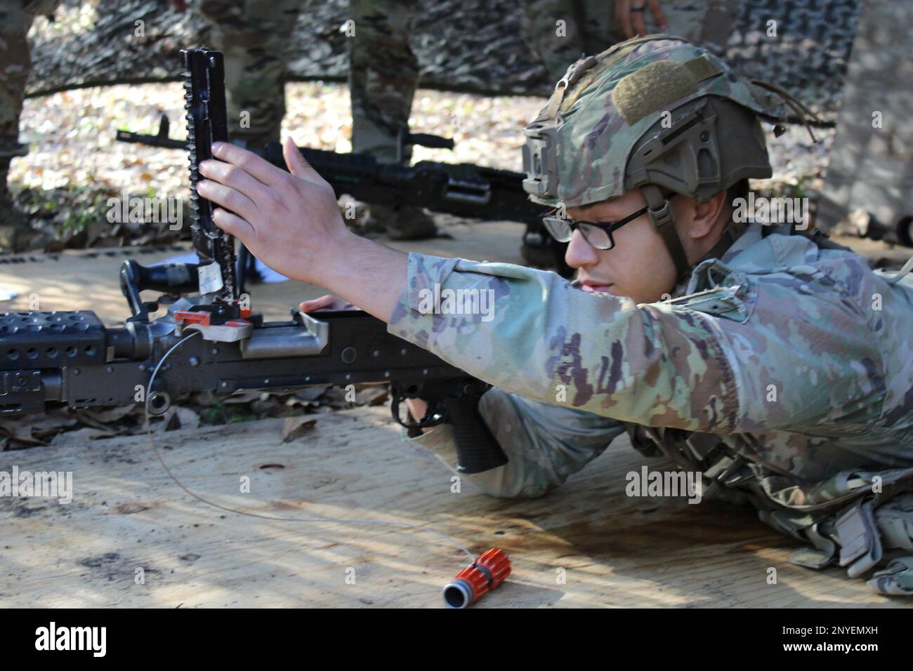 A soldier from the 3rd Infantry Division disassembles and resembles a ...