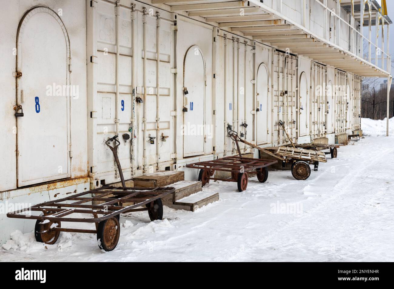 a trolley for transporting goods stands on the street Stock Photo - Alamy