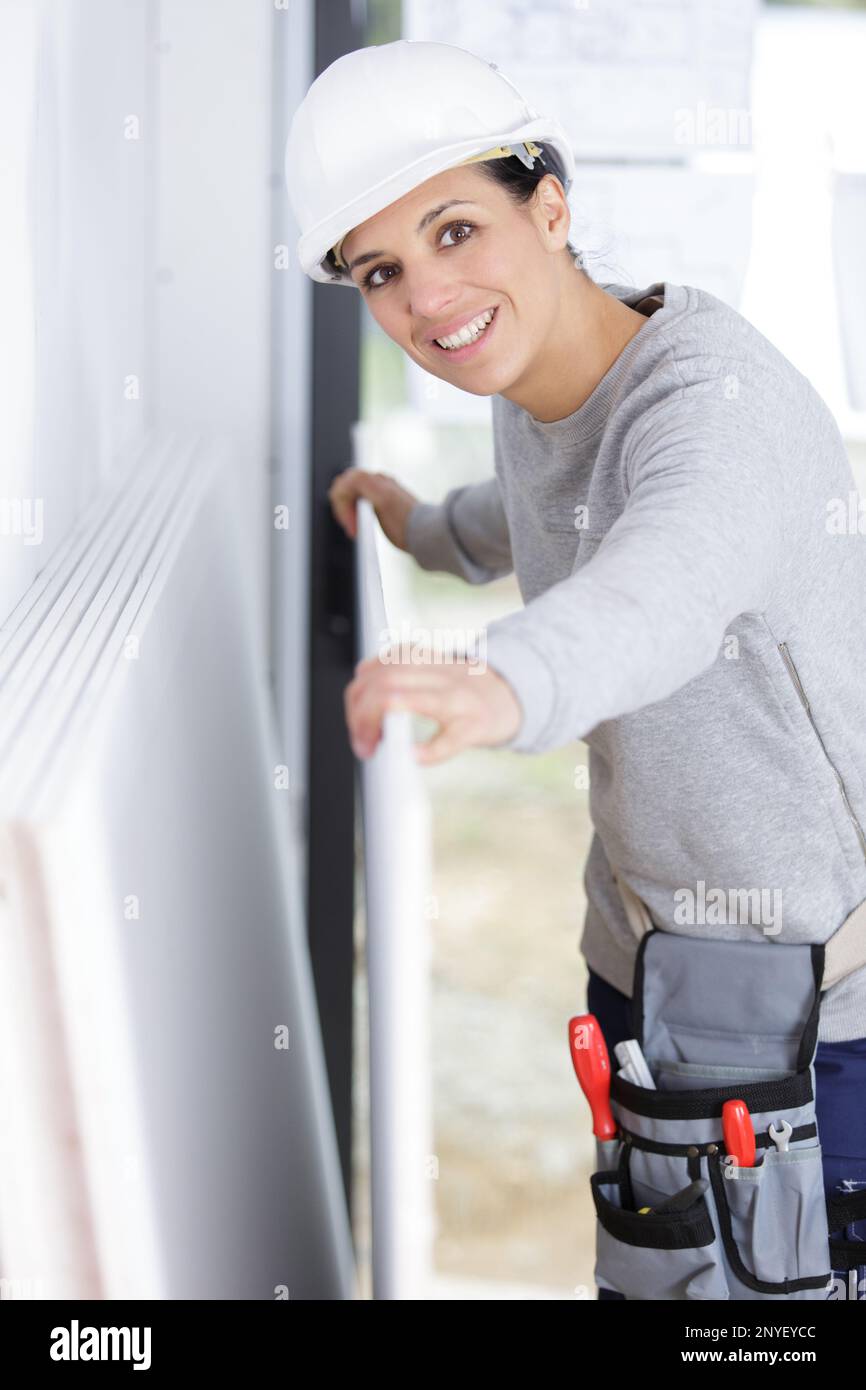 Plasterer finishing wall float hi-res stock photography and images - Alamy