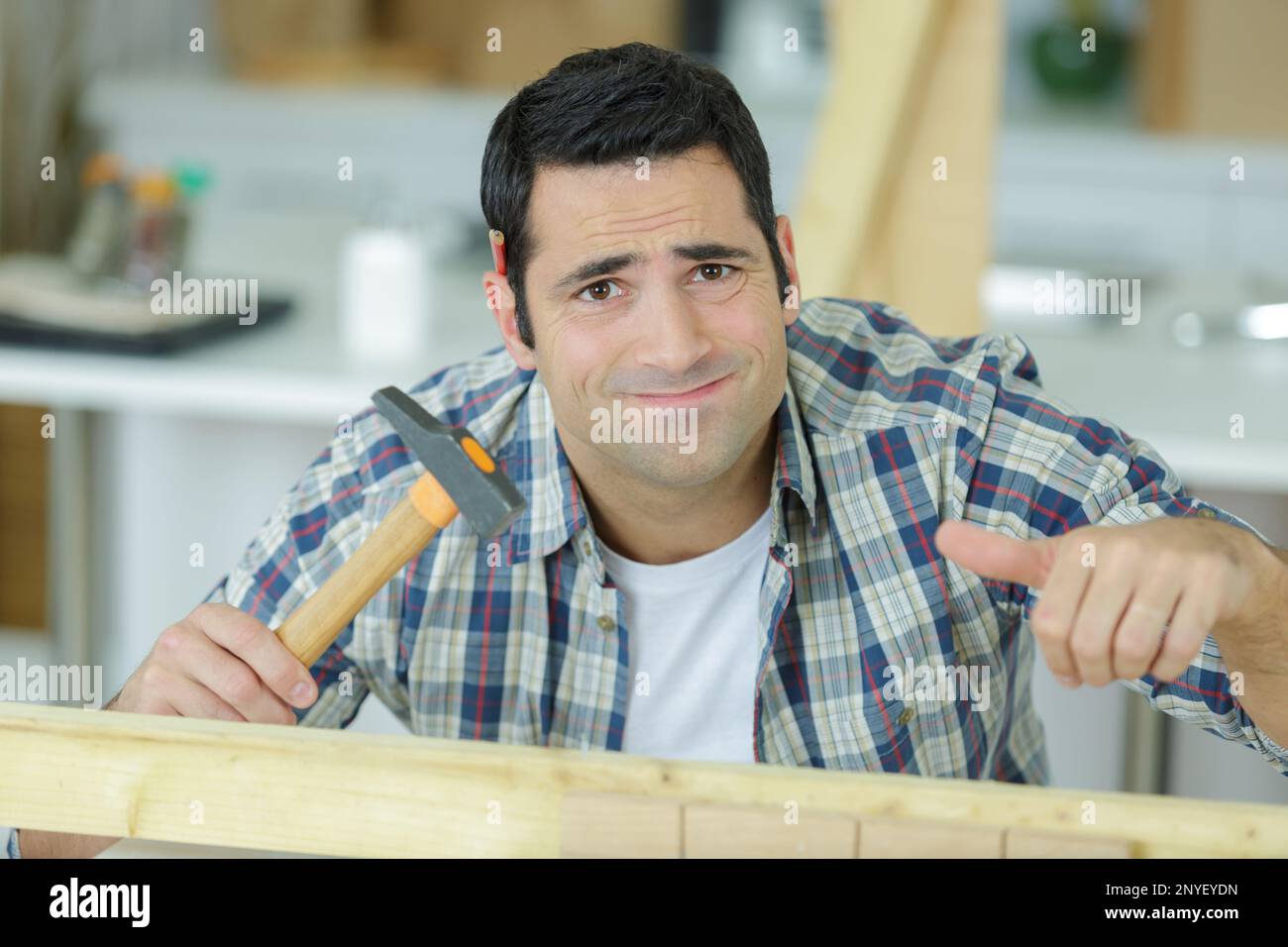 Hit finger with hammer hi-res stock photography and images - Alamy