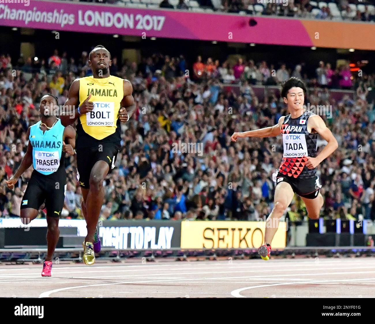 (L to R) Bahamas' Warren Fraser, Jamaica's Usain Bolt and Japan's ...