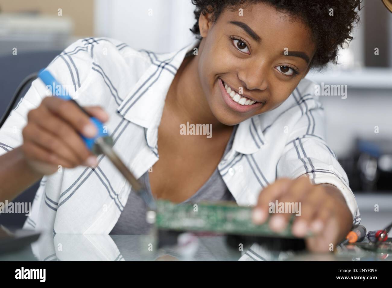 Soldering smiling hi-res stock photography and images - Alamy