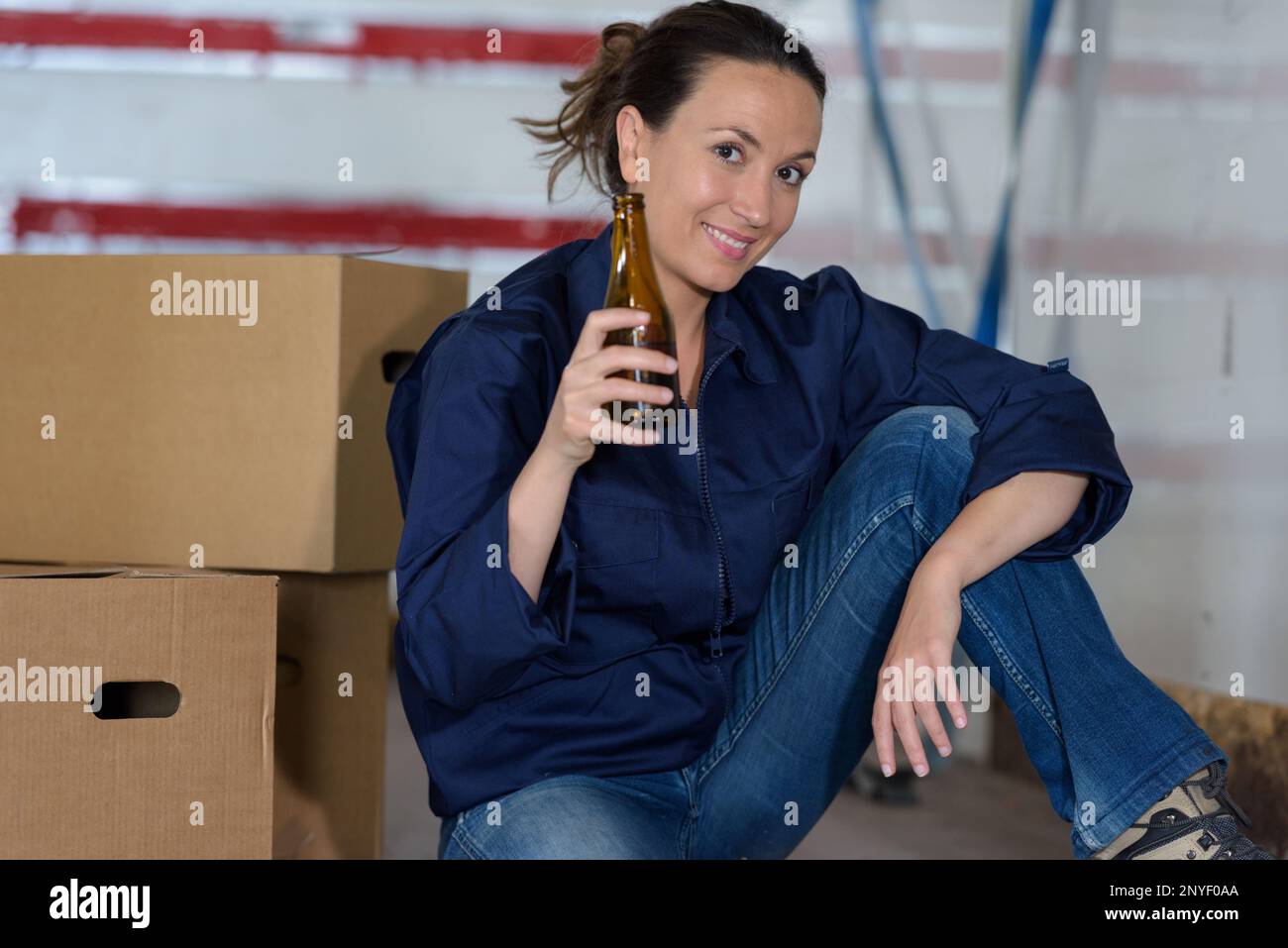 portrait of a woman chilling with beer Stock Photo - Alamy