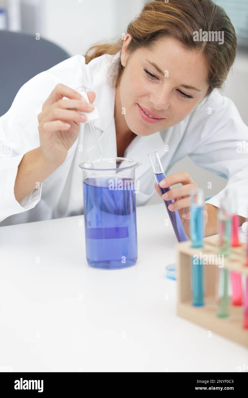Scientist using pipette in laboratory hi-res stock photography and ...