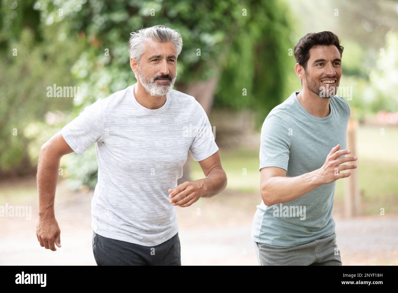 Older man running marathon hi-res stock photography and images - Alamy