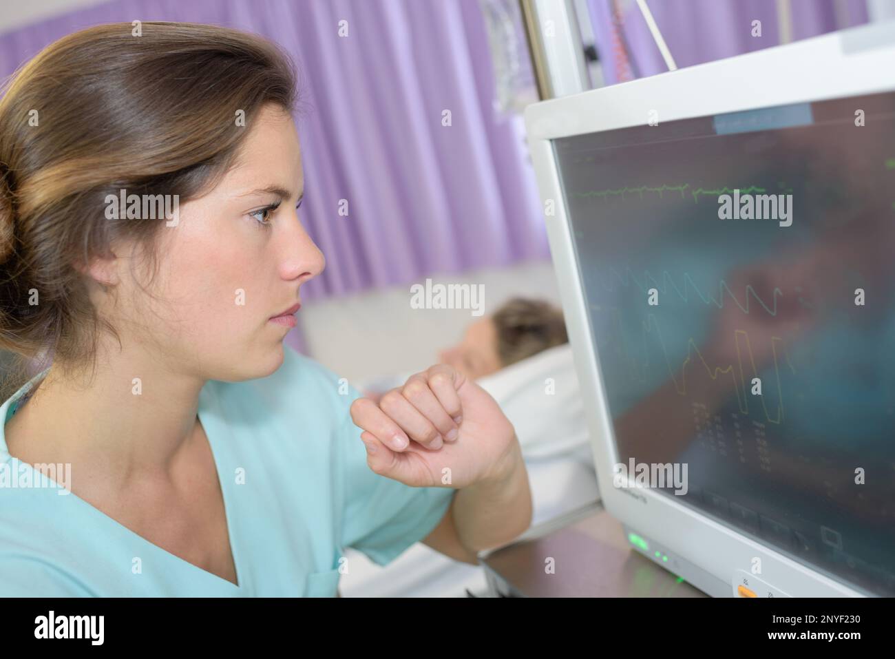 nurse checking computer Stock Photo - Alamy