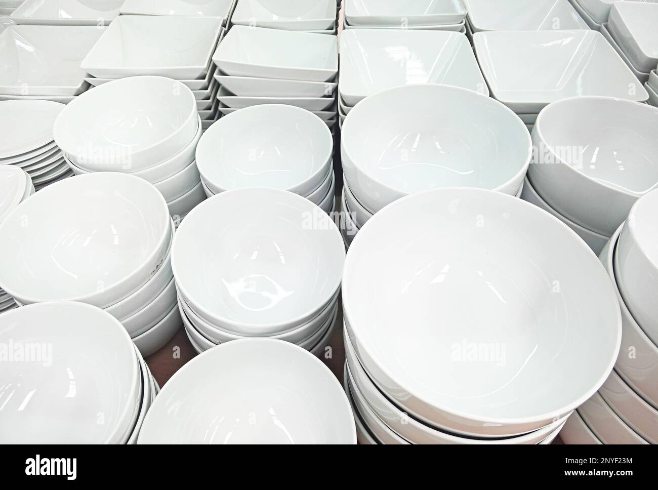 Stacks of plates in a shop Stock Photo - Alamy