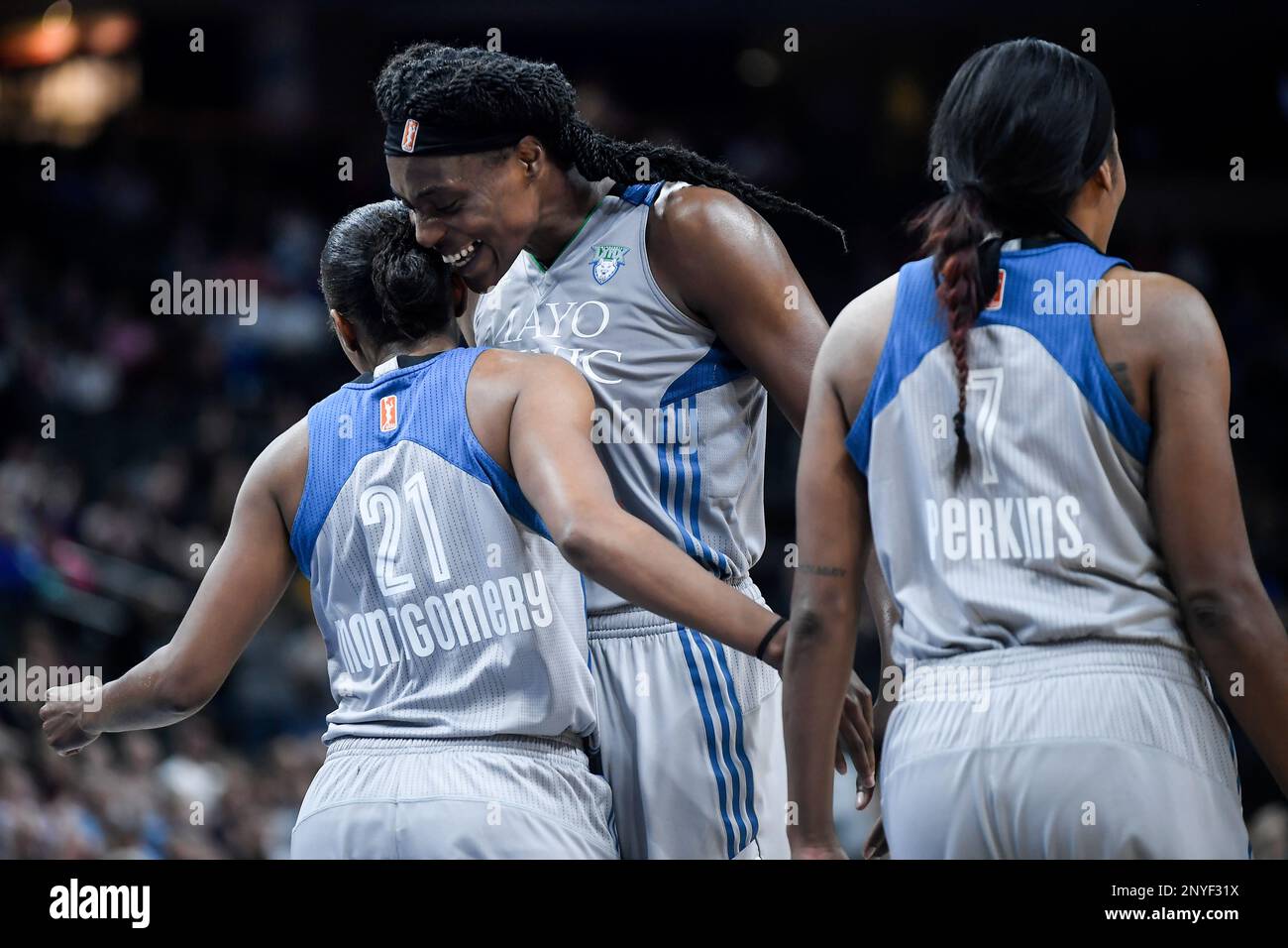 Minnesota Lynx center Sylvia Fowles bumps chests with guard Renee ...