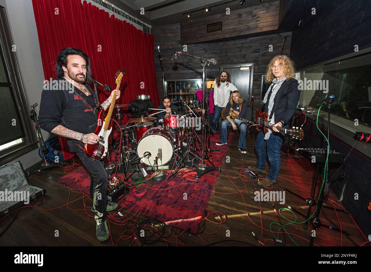 Marco Mendoza, Brian Tichy, John Corabi, Doug Aldrich, and David Lowy ...