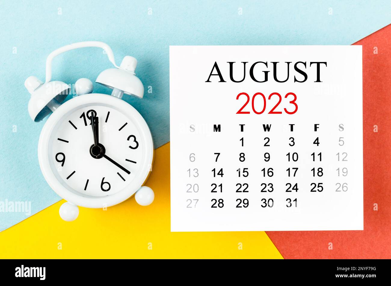 A August 2023 Monthly calendar year with alarm clock on colorful ...