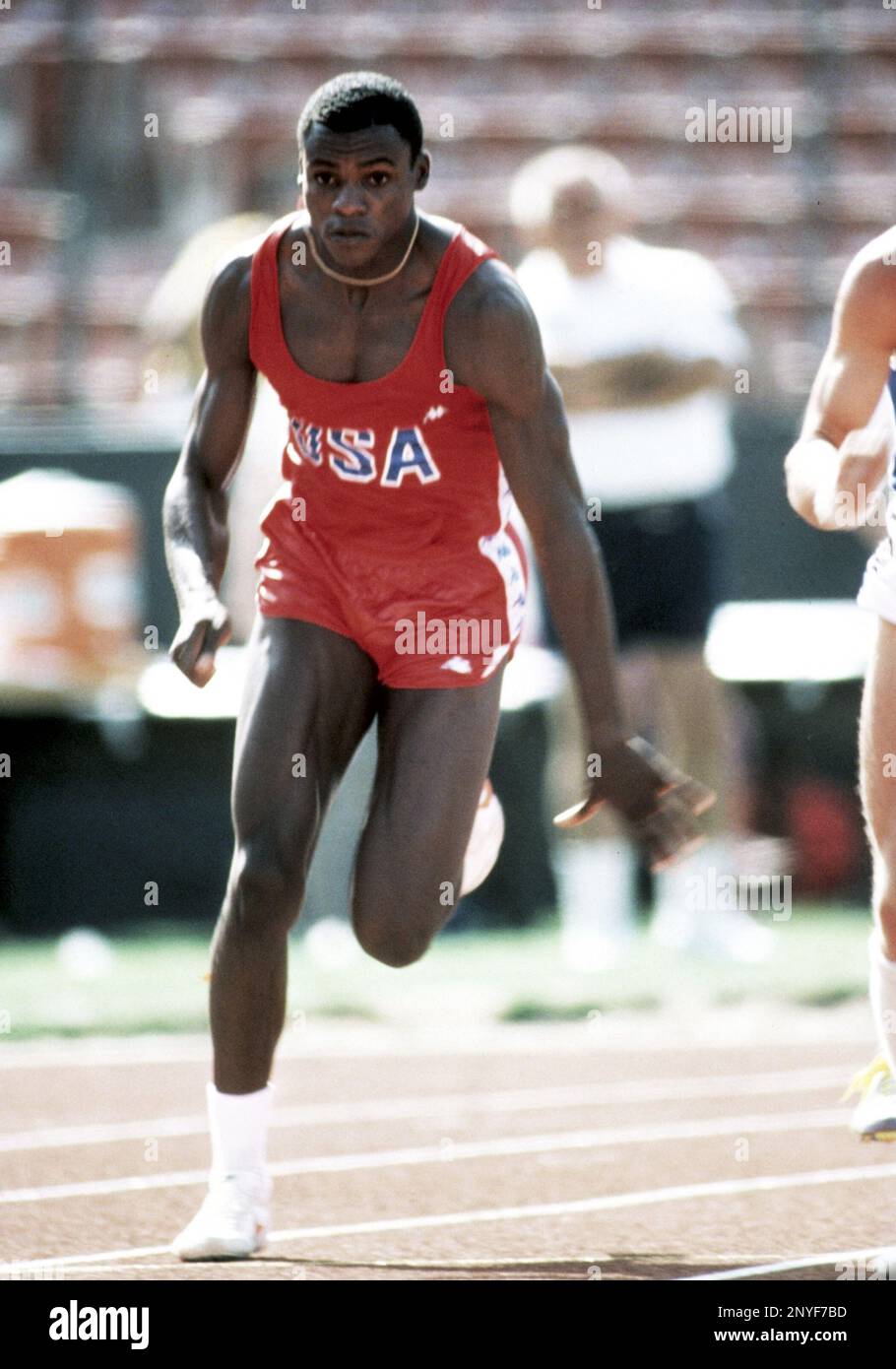 Sprinter Carl Lewis runs in a relay in 1983 in Los Angeles. (Photo by A ...