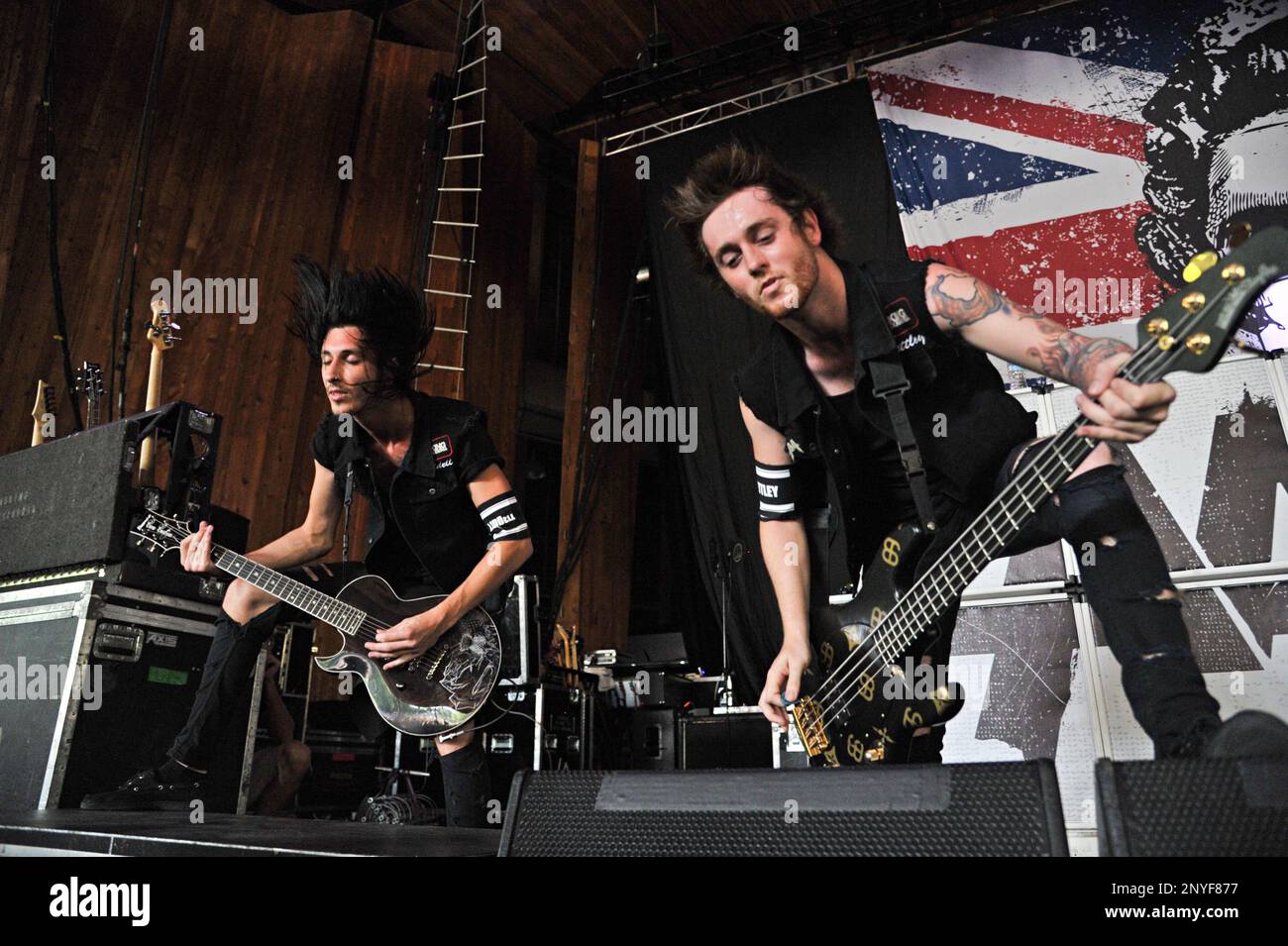Cameron Liddell and Sam Bettley of Asking Alexandria perform during the ...